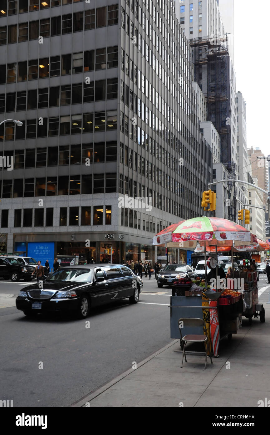 Food stalls 2 mobile standing grey flagstones sidewalk right foreground ...