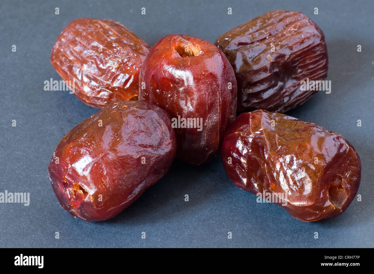 Pitted red dates in studio setting Stock Photo - Alamy