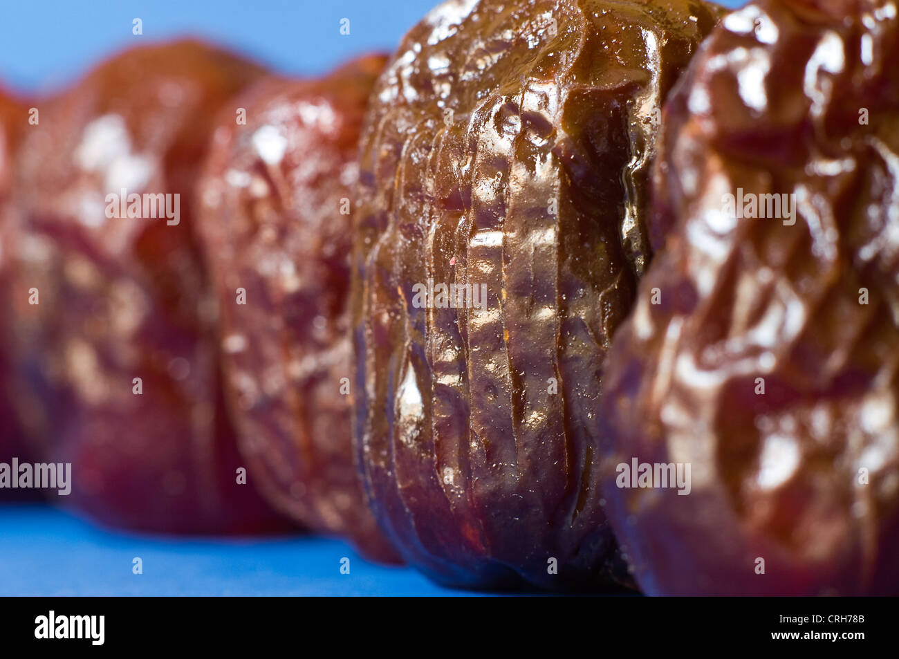 Pitted red dates in studio setting Stock Photo - Alamy