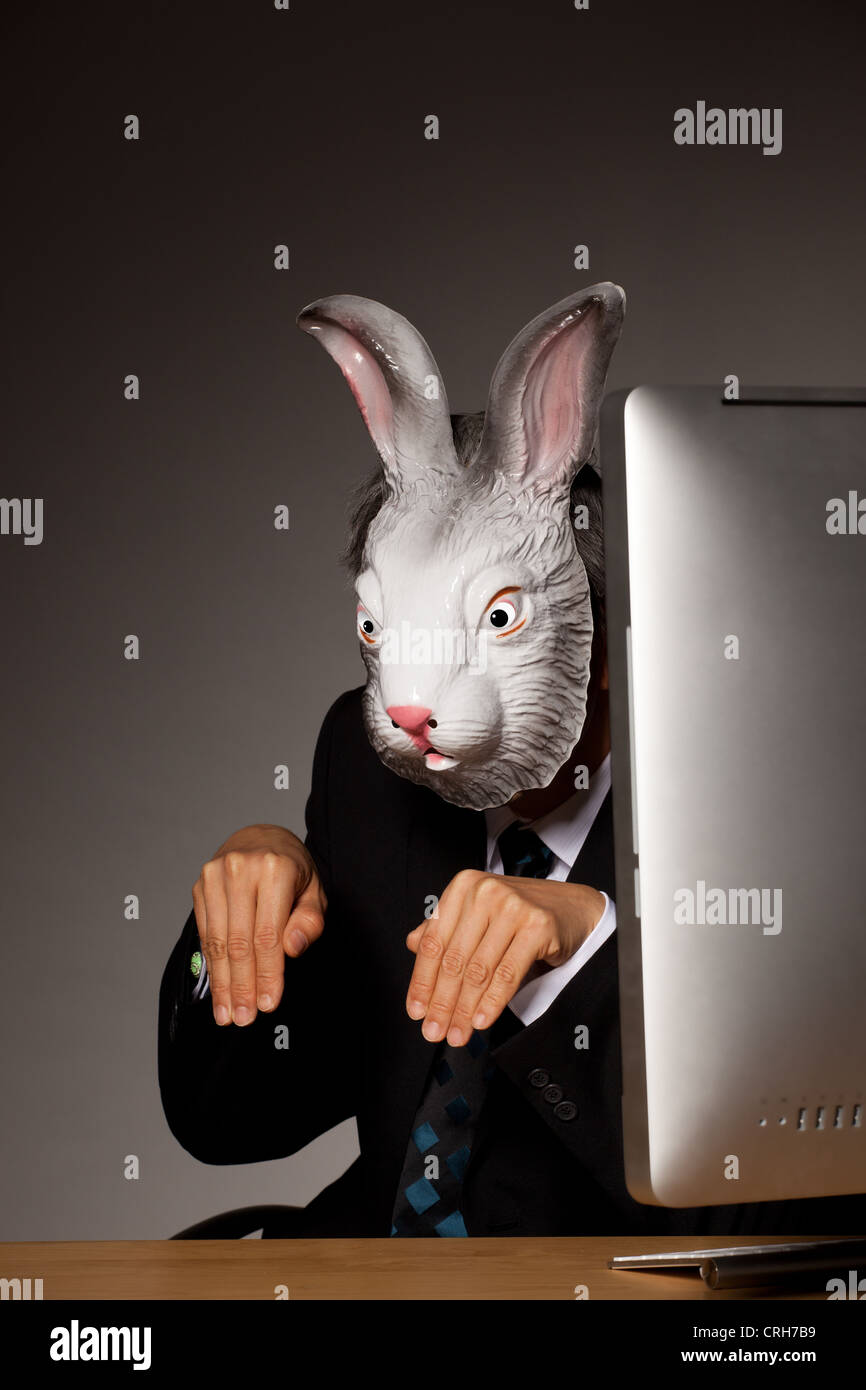 Back of man seated desk hi-res stock photography and images - Alamy