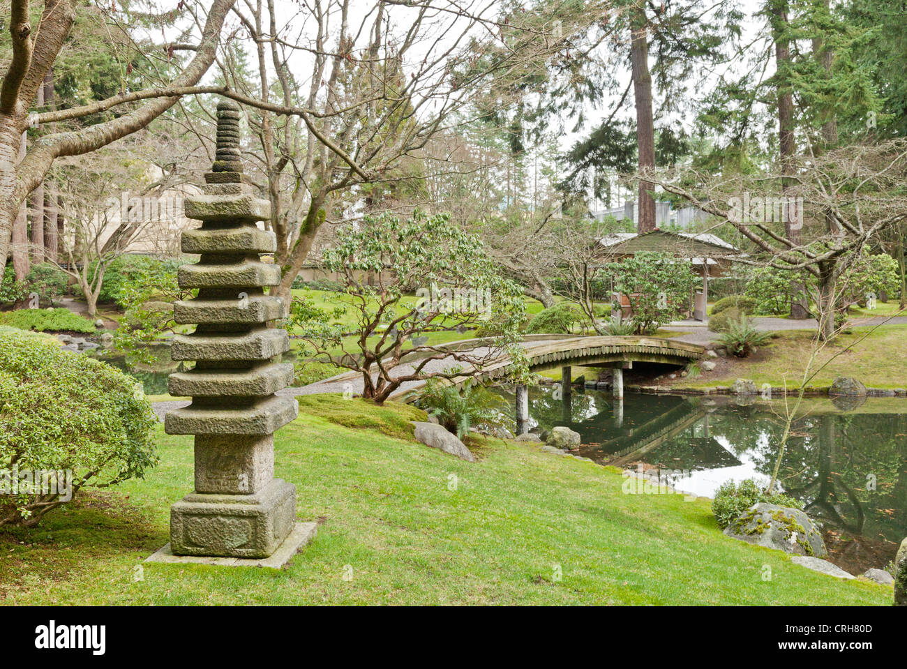 A stupa standing inside the Nitobe Memorial Garden on an overcast ...