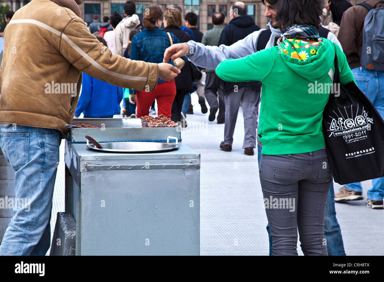 Tourists Buying Peanuts from Seller on Millennium Bridge Across River ...