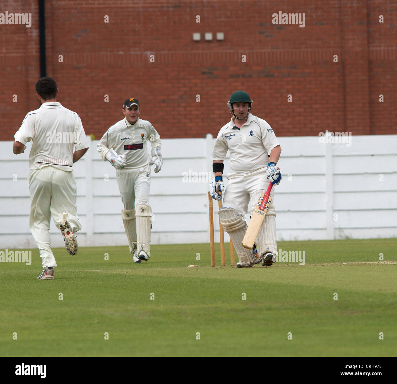Wicket keeper batsman and bowler hi-res stock photography and images ...
