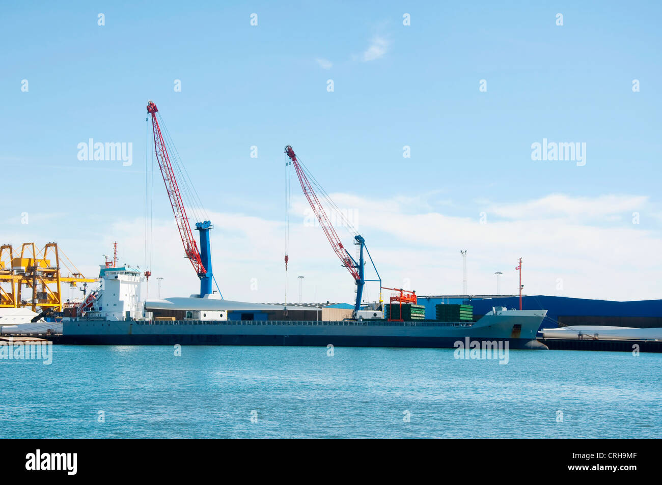 Cargo ship loading windmill parts Stock Photo - Alamy