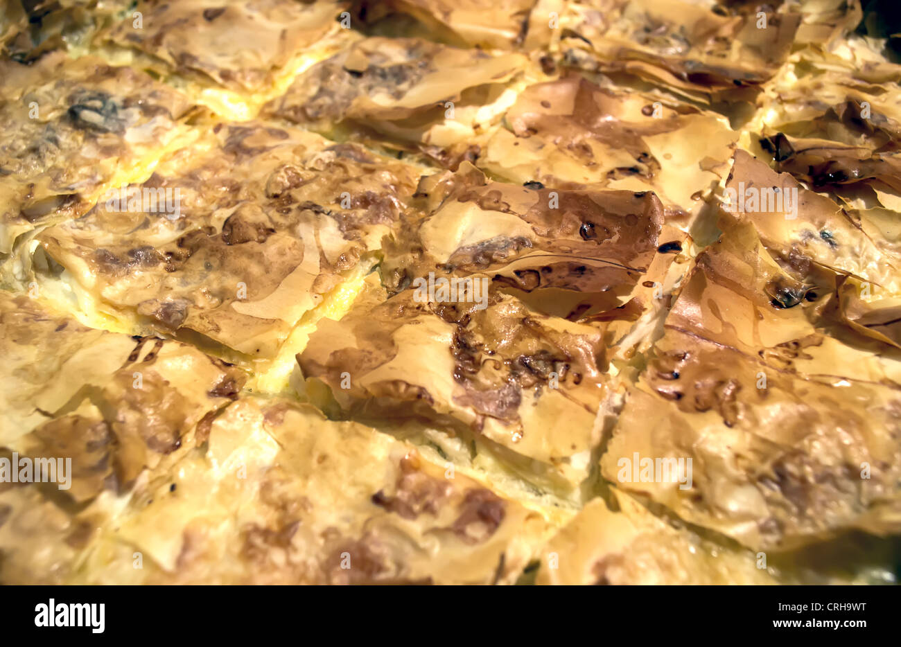 Pastry of pressed dough sheets with cheese and eggs Stock Photo - Alamy
