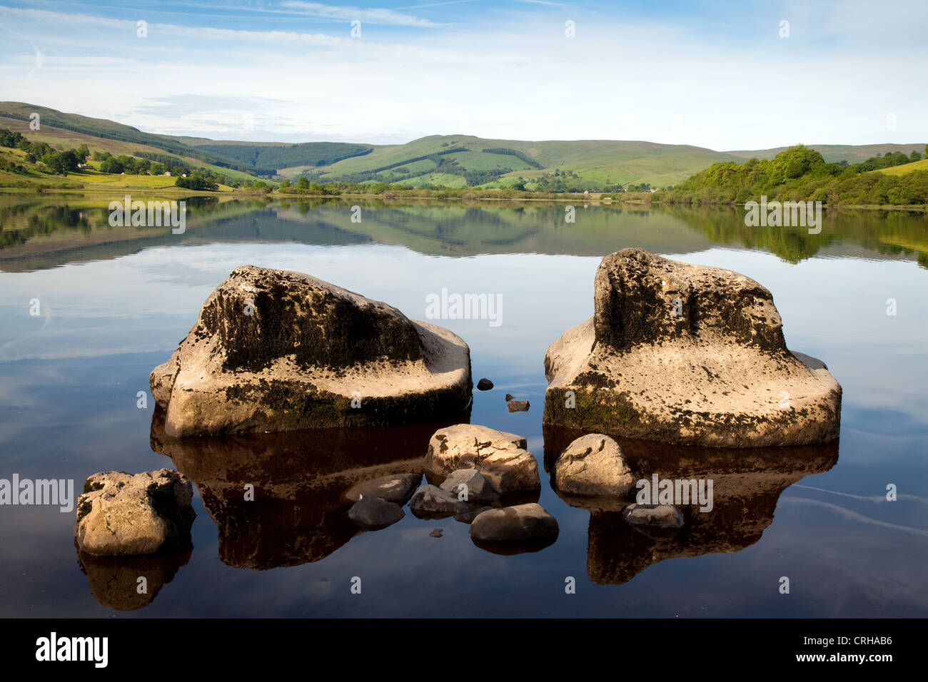 Water Polished Rocks, Placid lake Semerwater natural lake, and views to ...