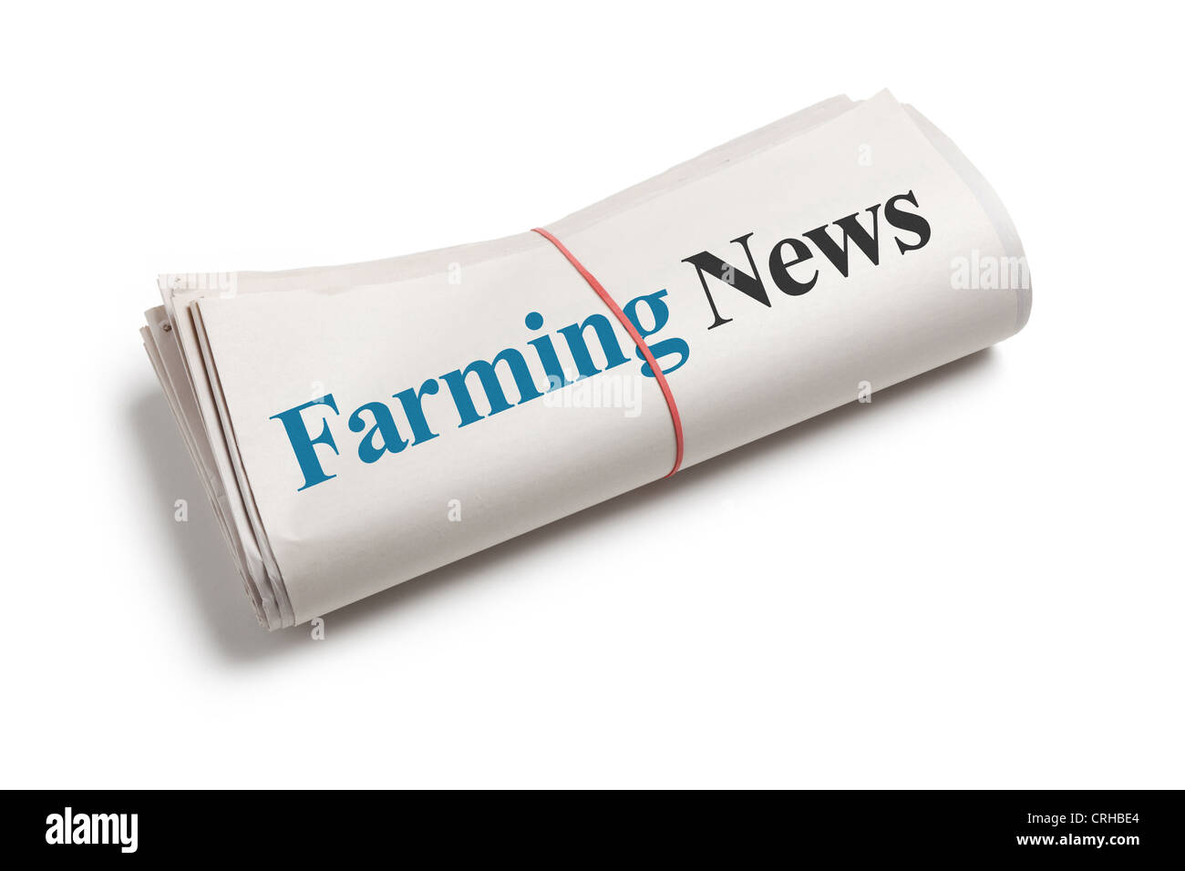 Farming news, Newspaper Roll with white background Stock Photo - Alamy