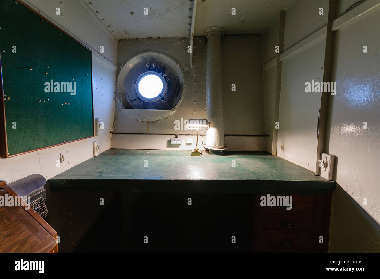 Desk in a cabin on HMS Caroline, the last WW1 Royal Navy Battleship ...