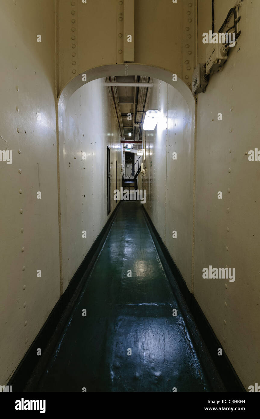 Corridor below decks in a ship built in the early 1900s Stock Photo - Alamy