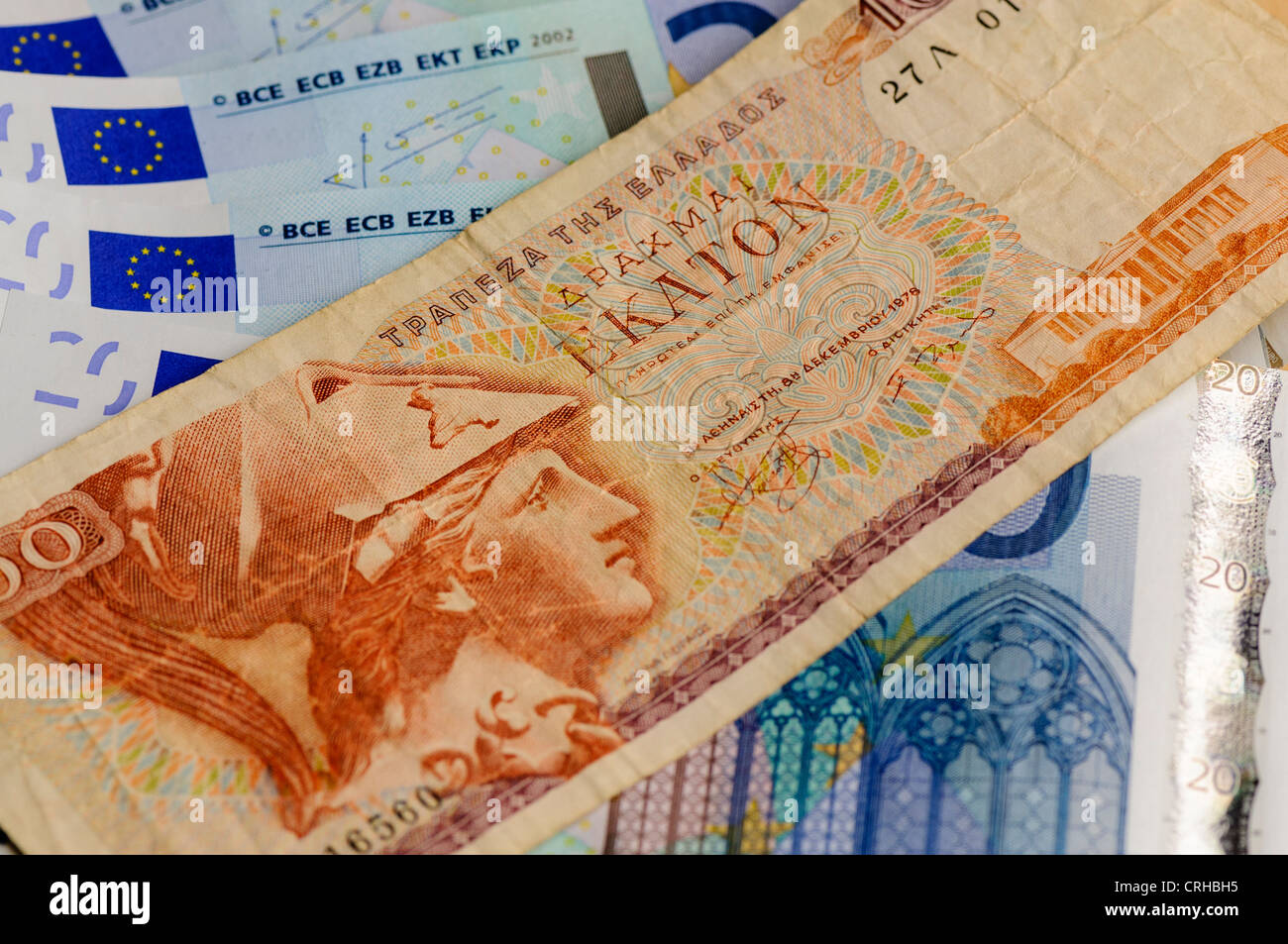 100 Greek drachma bank note against a number of Euro notes Stock Photo ...