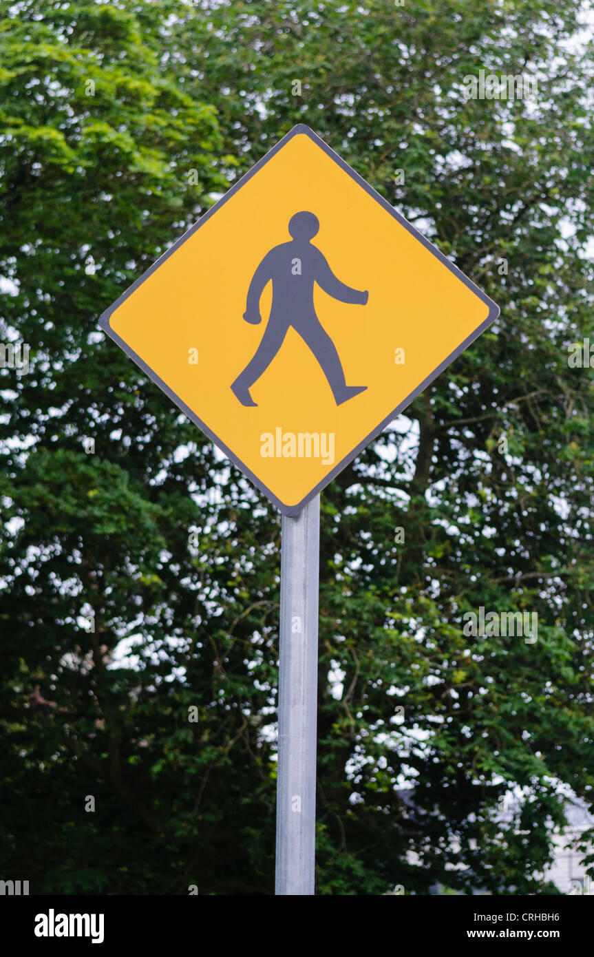 Pedestrian crossing road sign in Ireland Stock Photo - Alamy