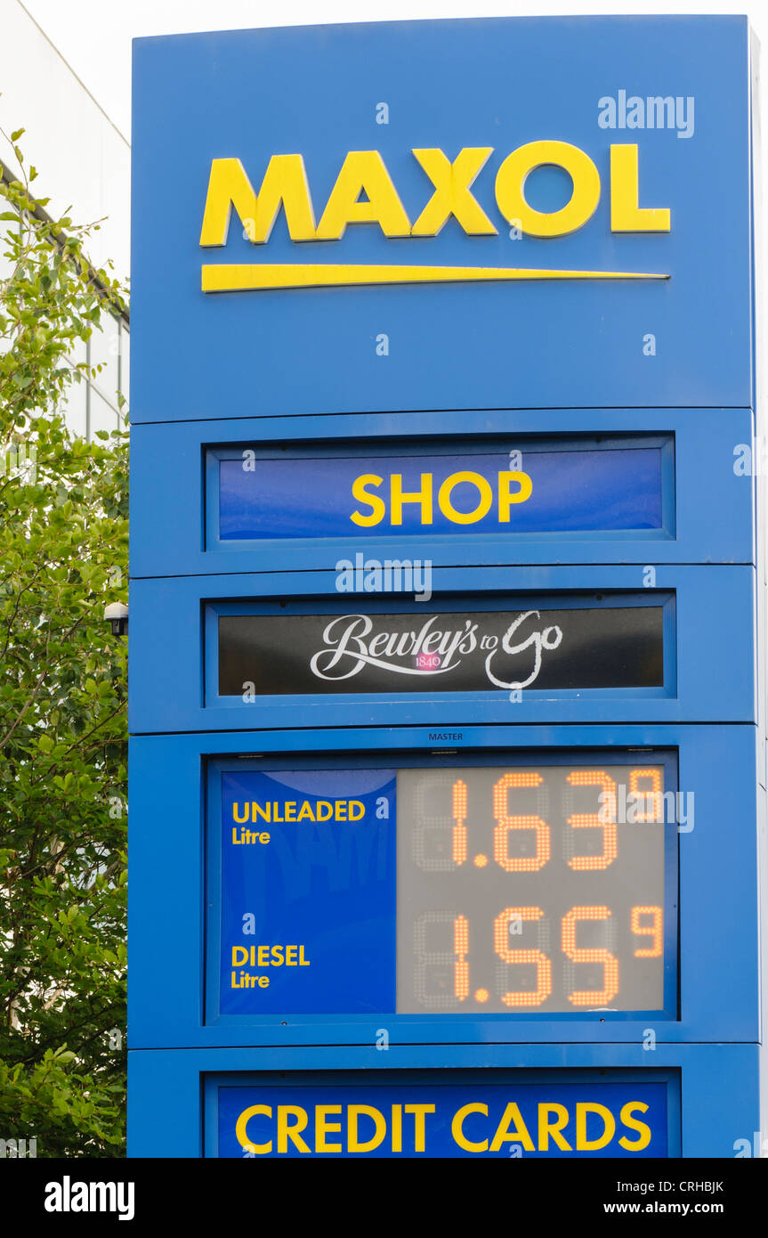 Sign on a Maxol petrol station showing unleaded petrol on sale for 163. ...