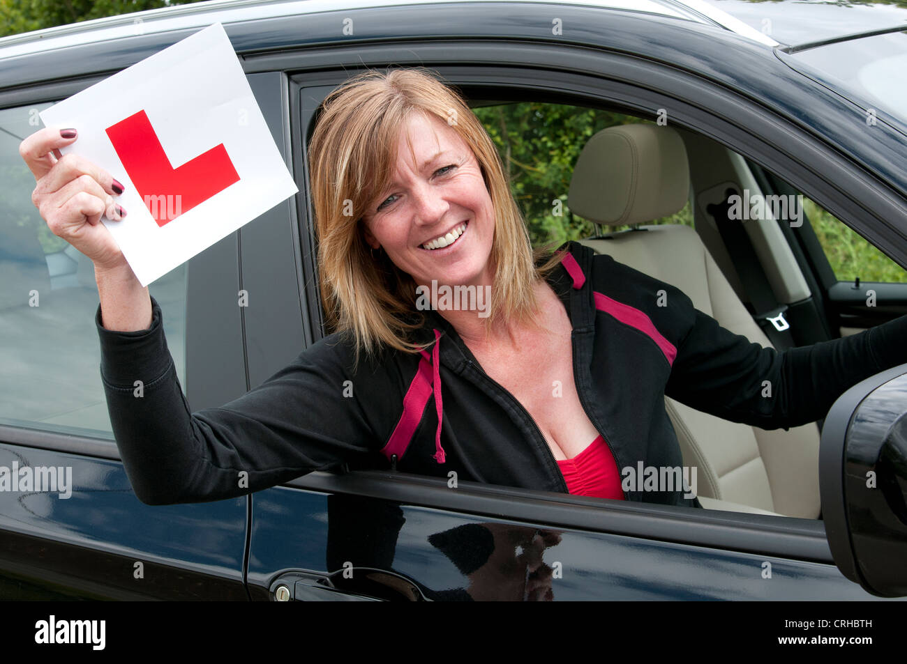 Mature woman driving test hi-res stock photography and images - Alamy