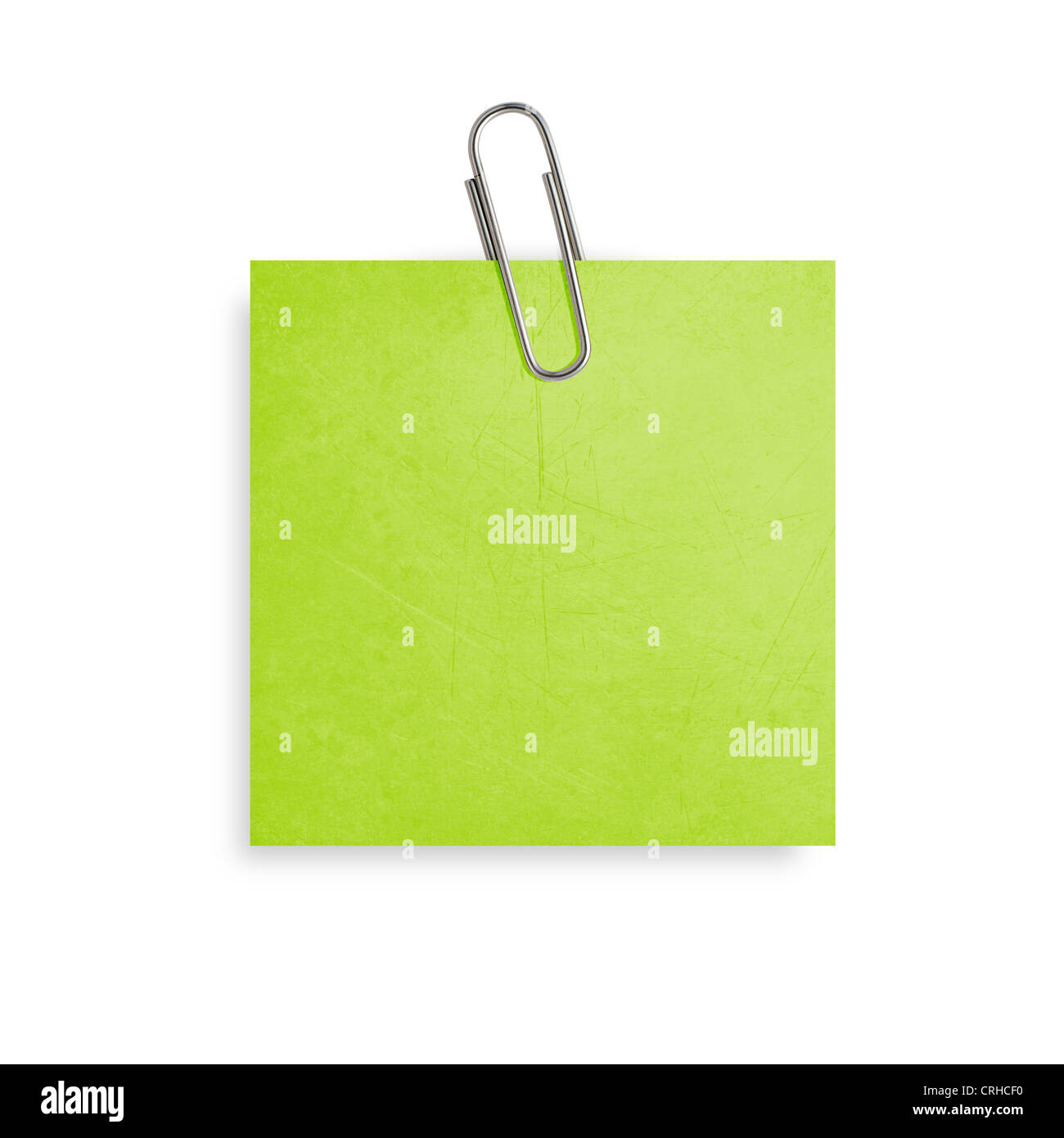 Green Note paper with paper clip on white background Stock Photo - Alamy