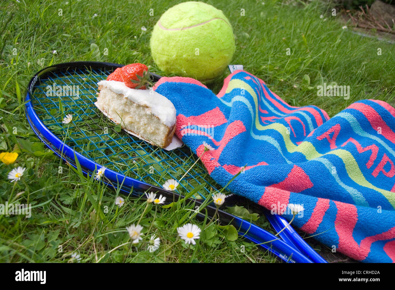 Tennis racquet and ball on grass showing dashed Hopes Stock Photo - Alamy