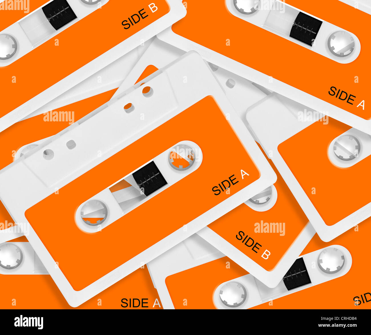 set of orange audio casettes background Stock Photo - Alamy