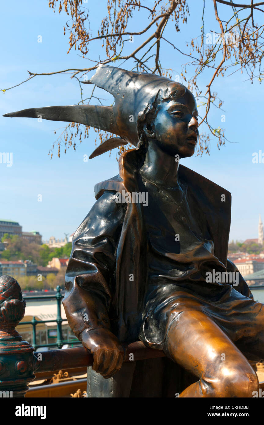 The statue of the Little Princess statue sitting on the railings of the ...