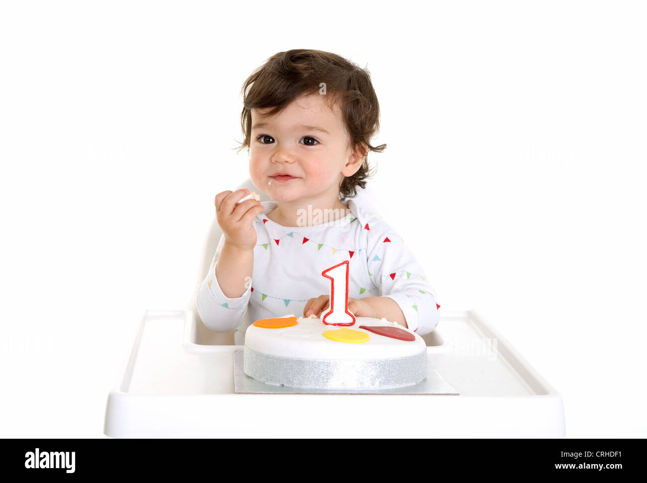 Baby eating birthday cake Stock Photo - Alamy