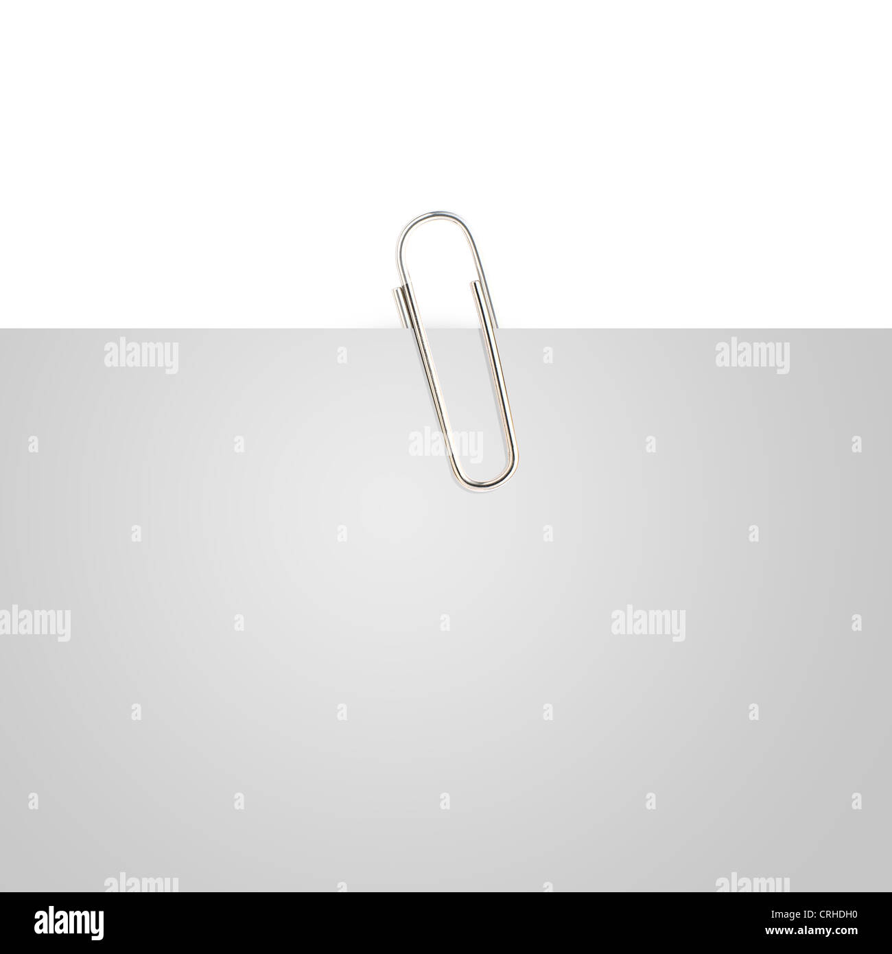 Gray note paper with paper clip on white background Stock Photo - Alamy