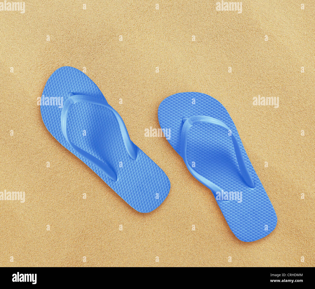 a pair of flip flops on the beach sand, Summer back concept Stock Photo ...