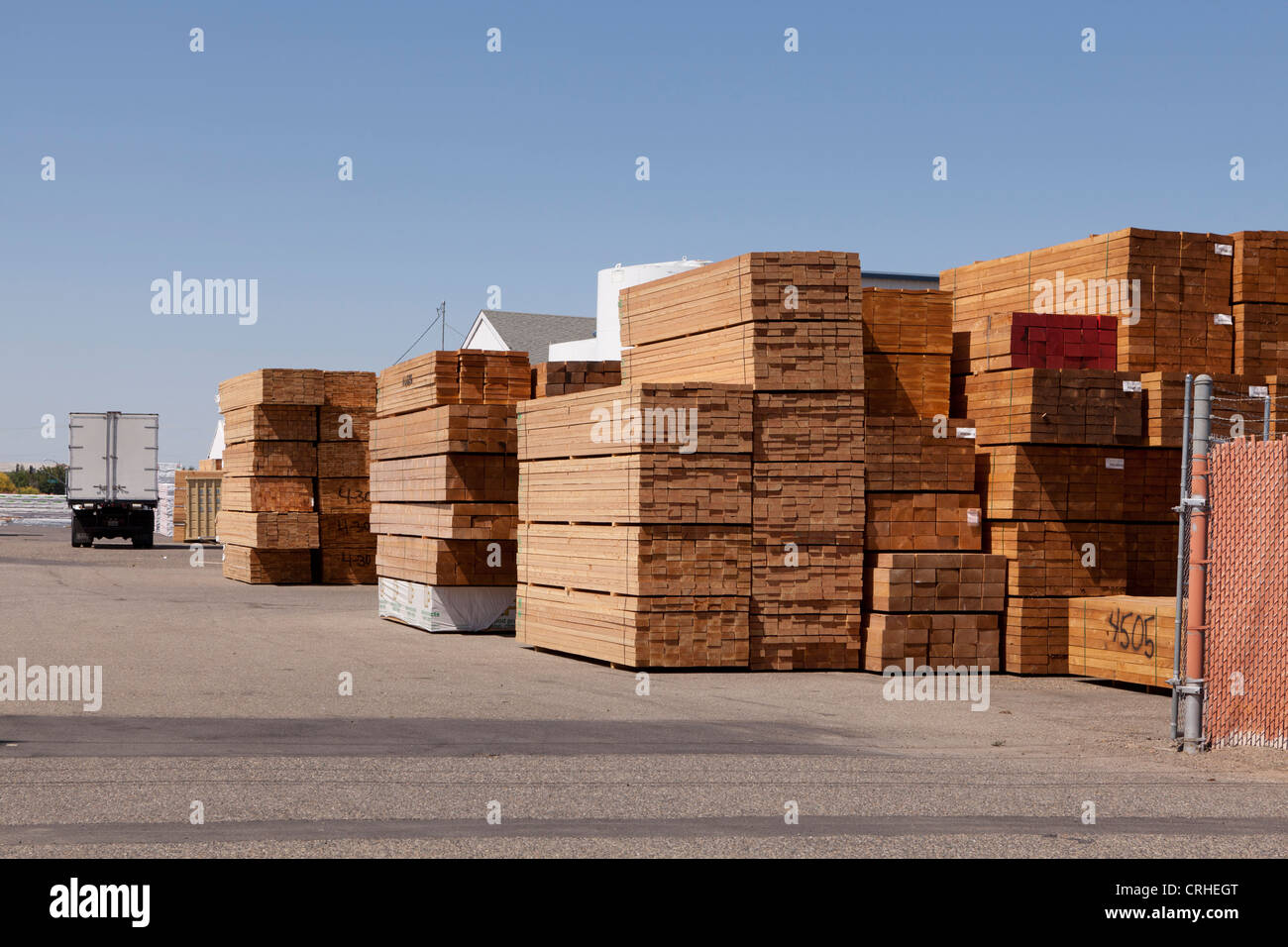 Stacked lumber at a lumber yard Stock Photo - Alamy
