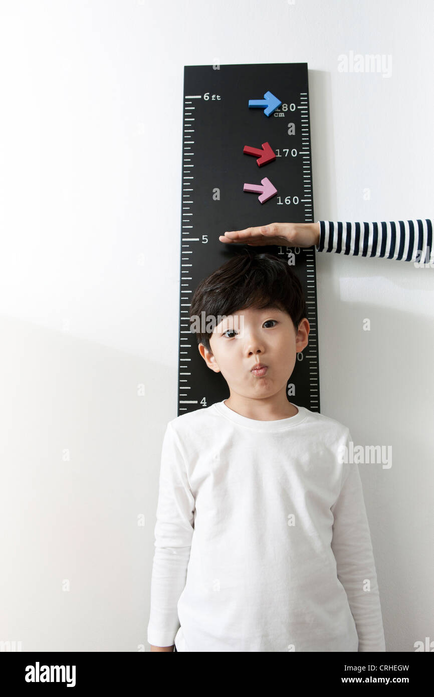 Measuring body height hi-res stock photography and images - Alamy