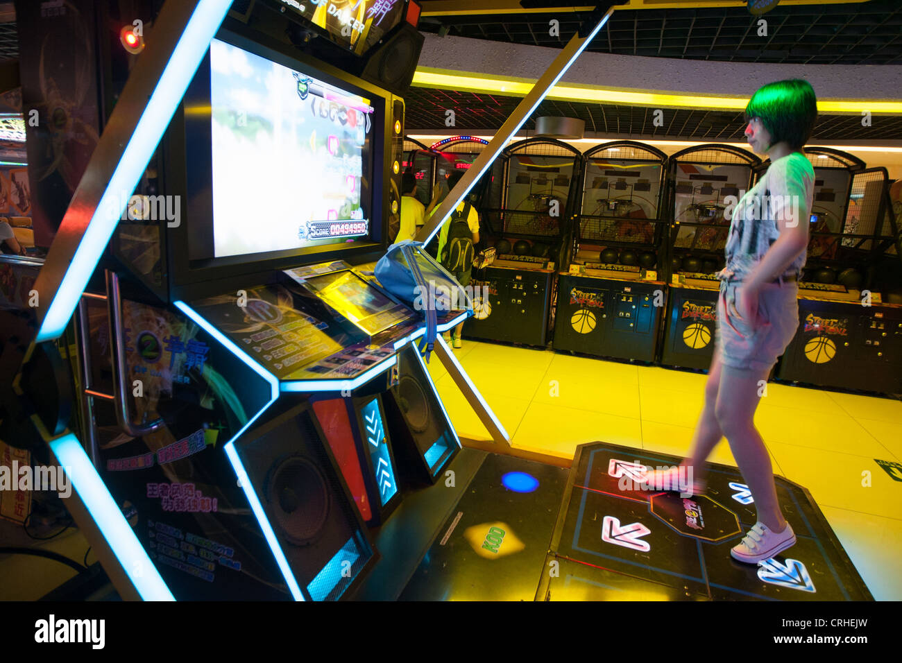 Amusement gaming entertainment arcade with shoppers, in Beijing, China ...