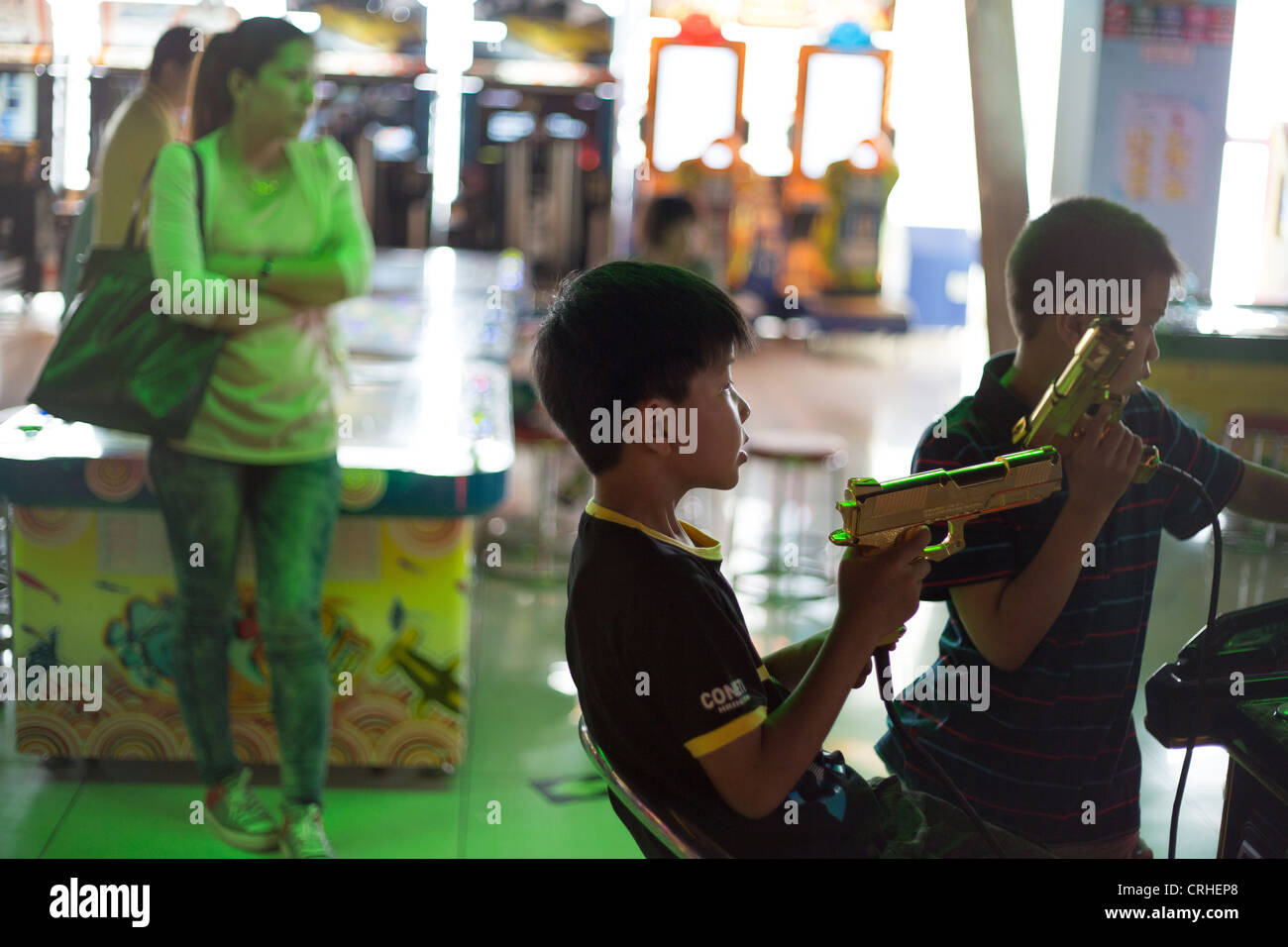 Amusement gaming entertainment arcade with shoppers, in Beijing, China ...