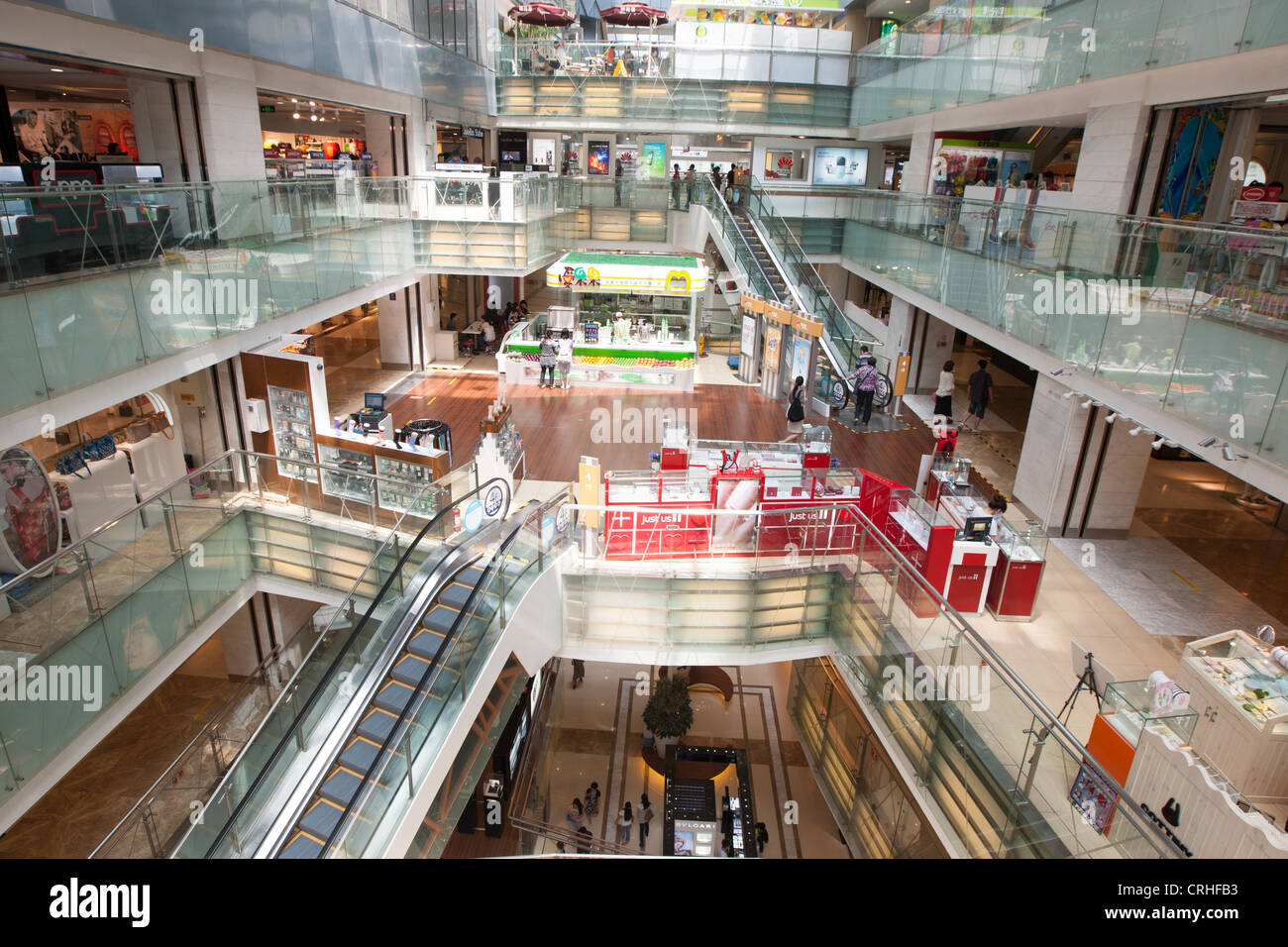 Shopping mall with shoppers, in Beijing, China Stock Photo - Alamy