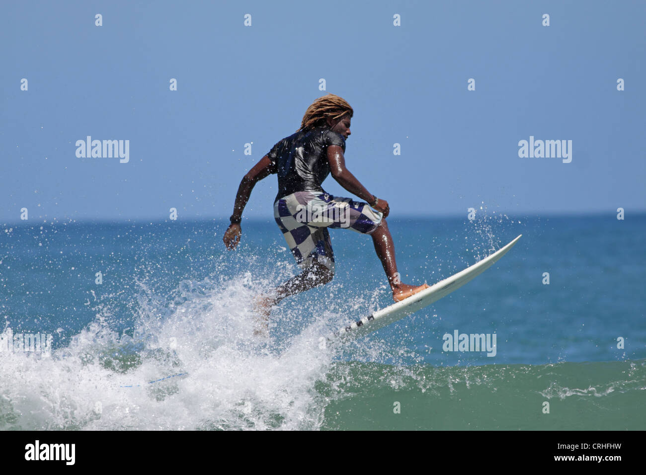 Surfer at Playa Cocles, Puerto Viejo, south Caribbean coast, Costa Rica ...