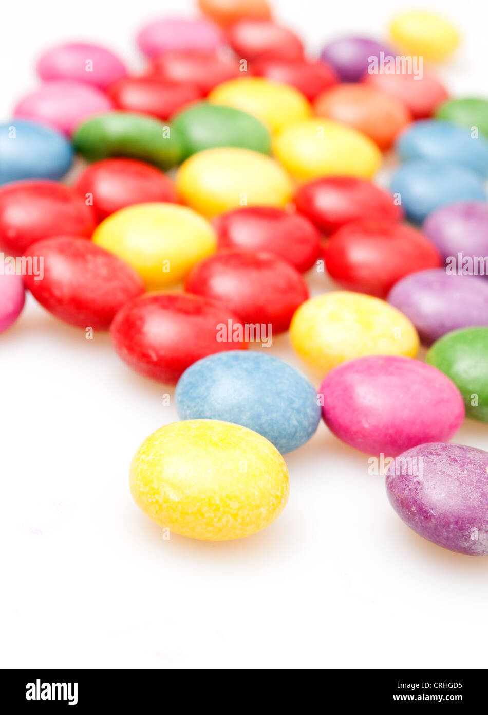 Round Candies in Many Colors on White Background Stock Photo - Alamy