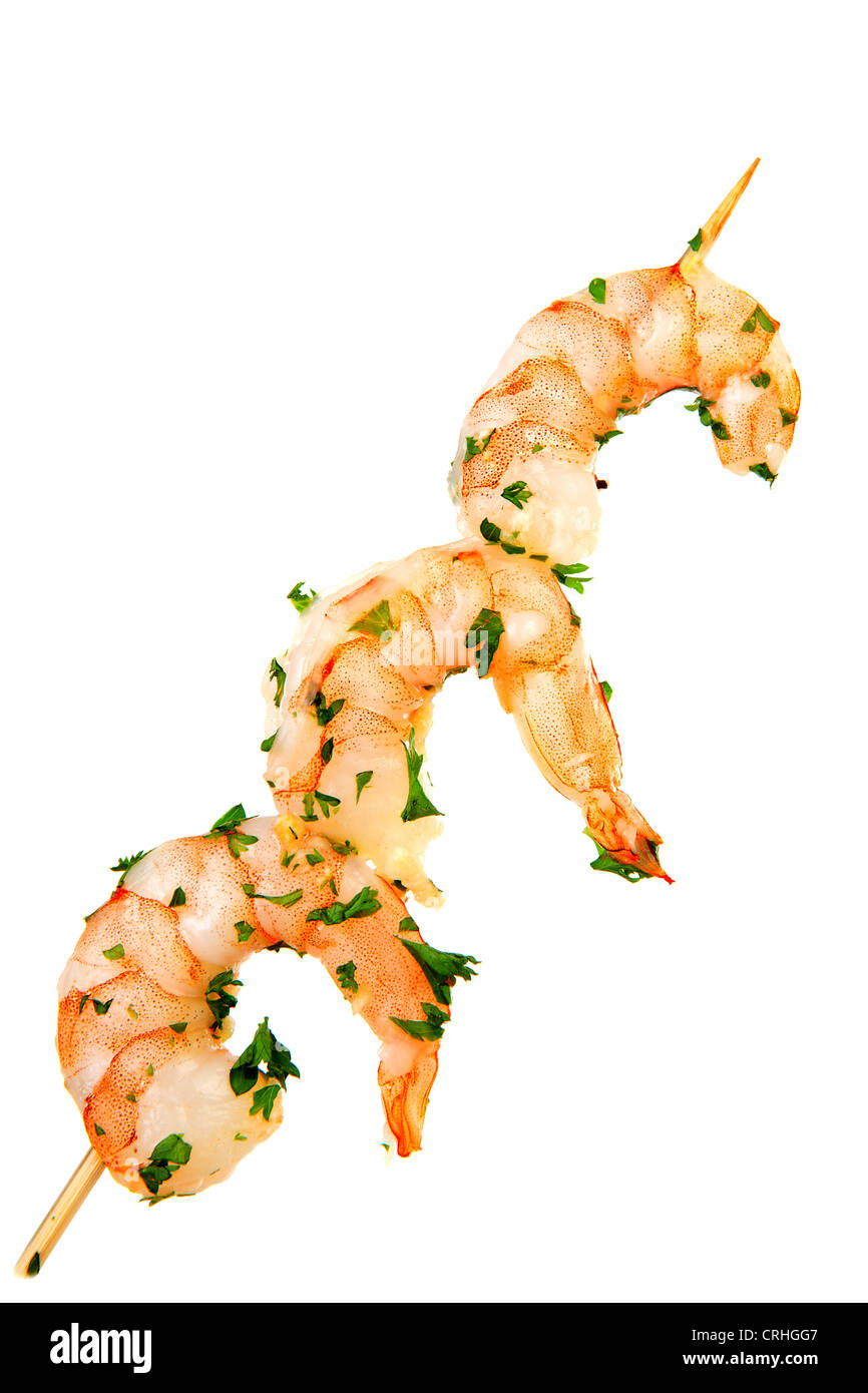 prawn snacks on stick over white background Stock Photo - Alamy