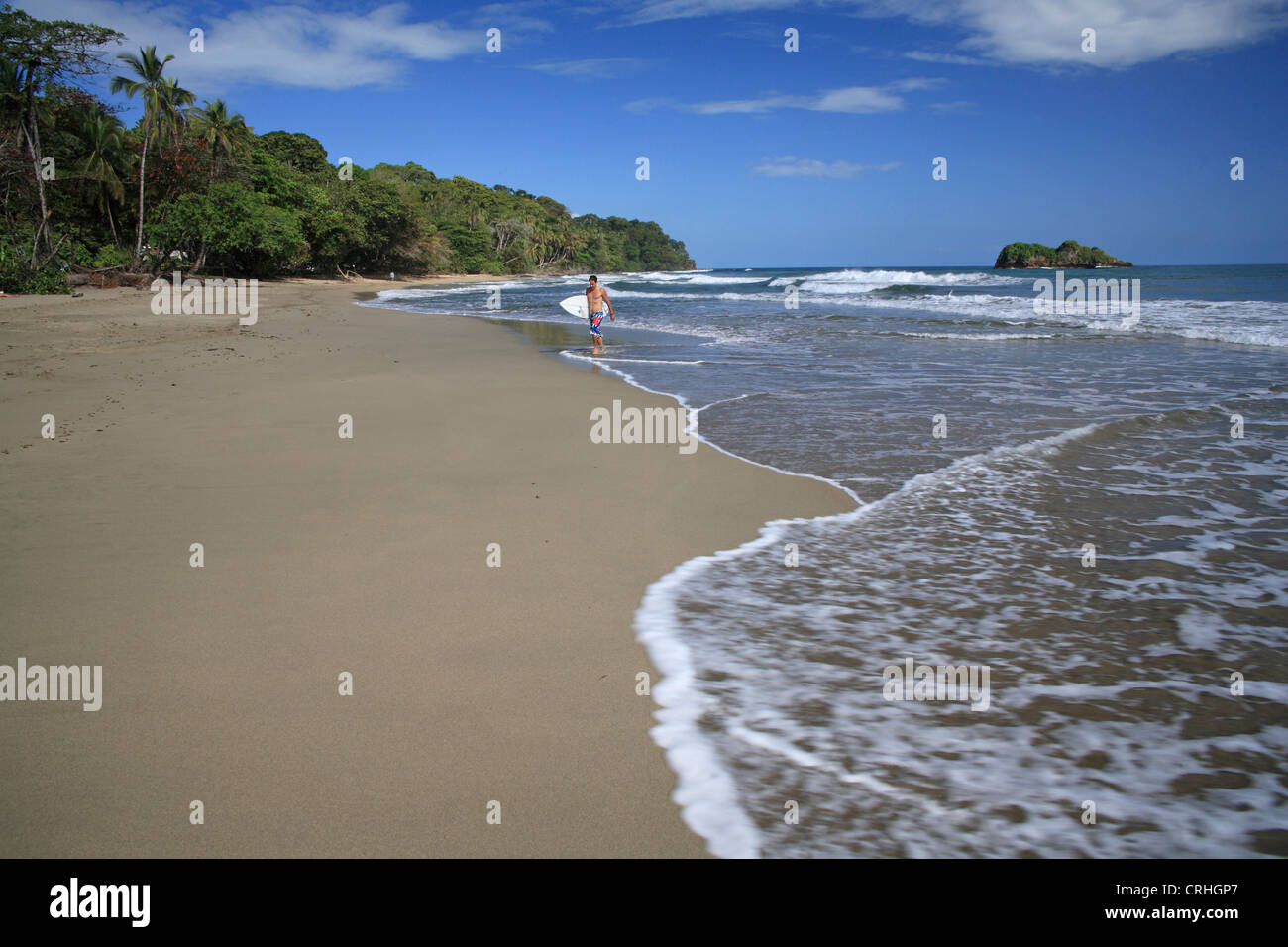 Surfer at Playa Cocles, near Puerto Viejo, Caribbean coast, Costa Rica ...
