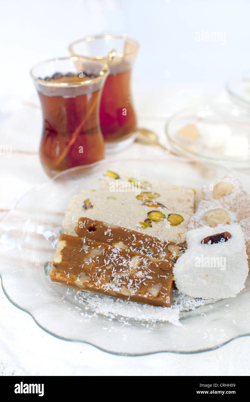 Turkish sweet confectionery - tahini halva and turkish delight served ...