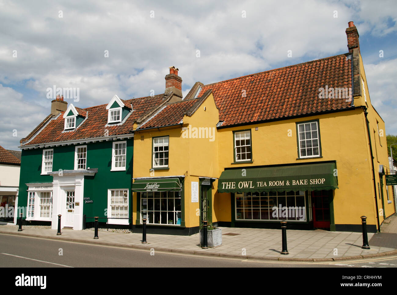 Pastel painted buildings historic Georgian market town Holt Norfolk ...