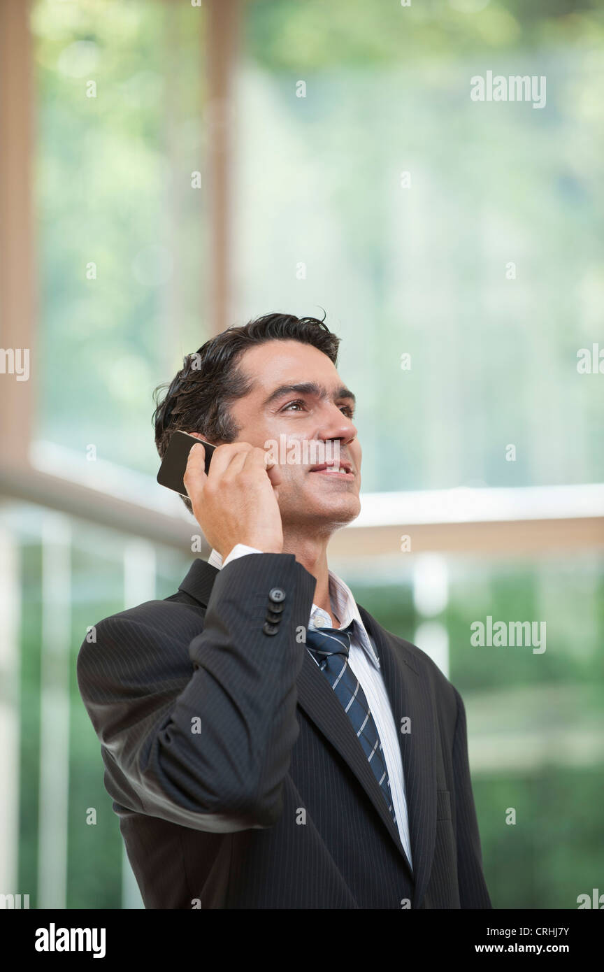 Businessman using cell phone Stock Photo - Alamy