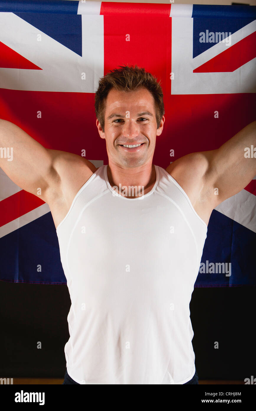 Male athlete in front of British flag, portrait Stock Photo - Alamy