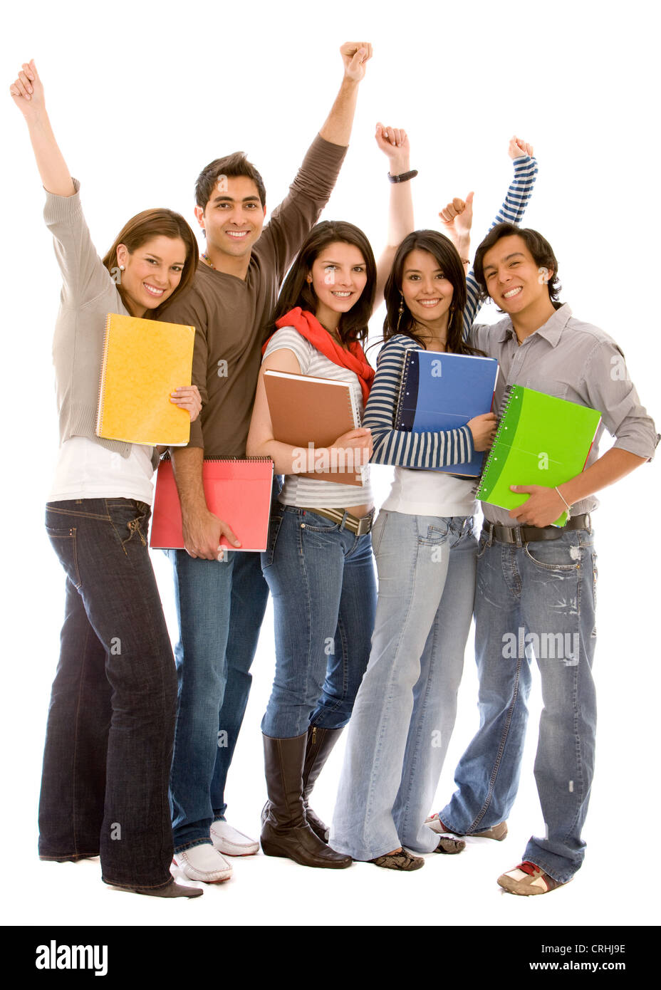 group of happy students standing together with their notebooks ...