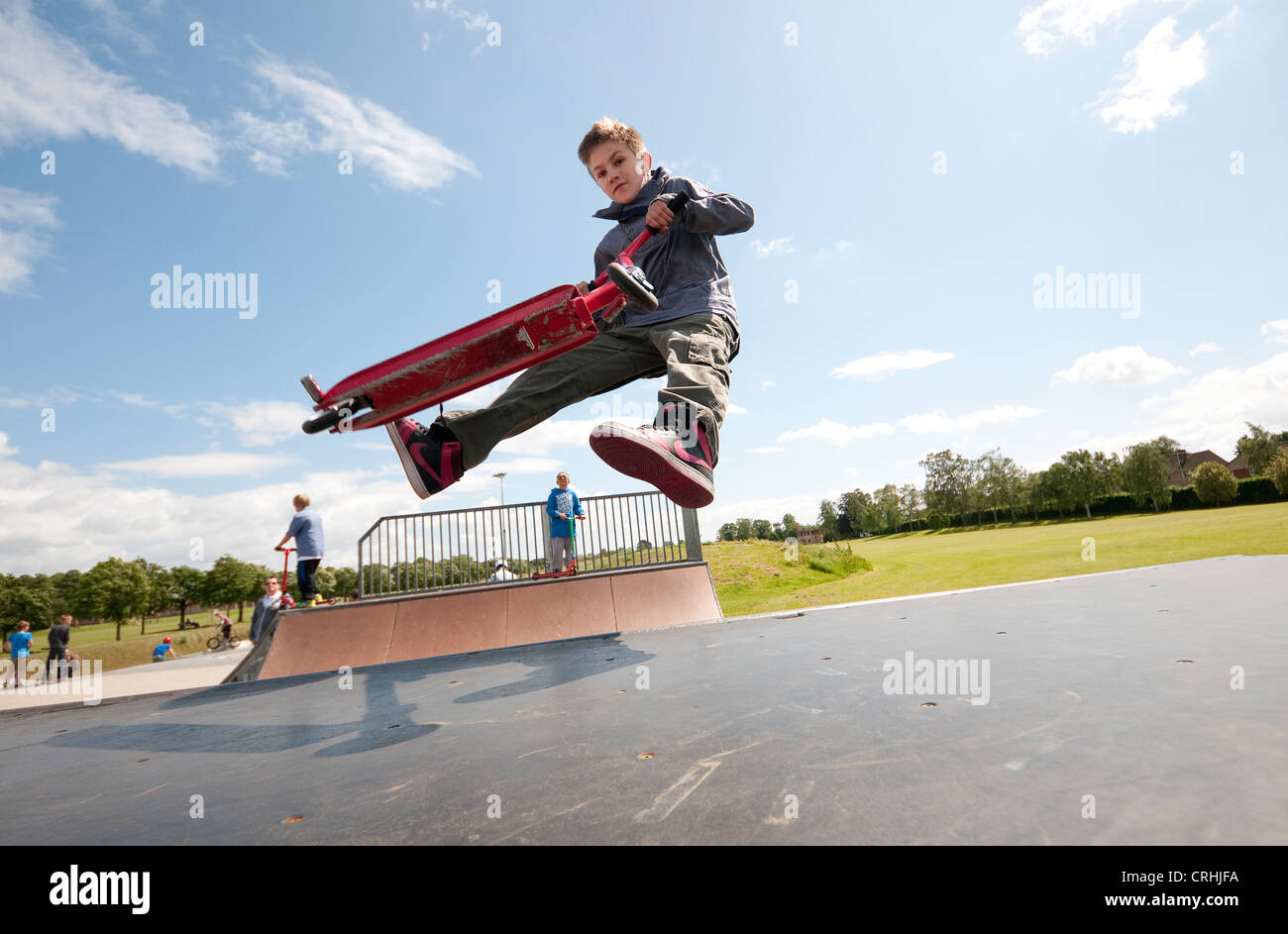 scooter rider in urban skate park, eaton park, norwich, norfolk ...