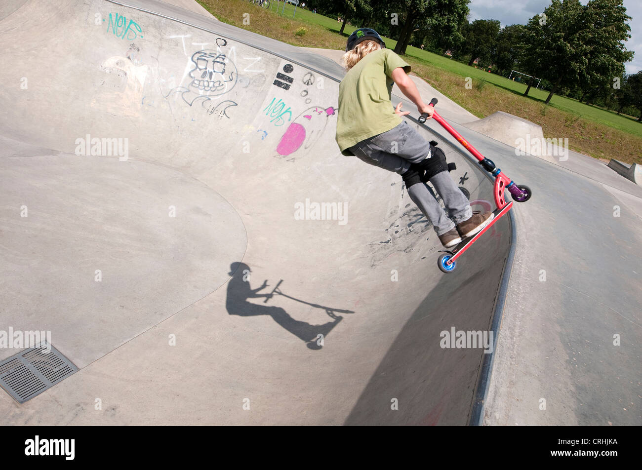 Boy On Scooter In The Skate Park Stock Photos & Boy On Scooter In The ...