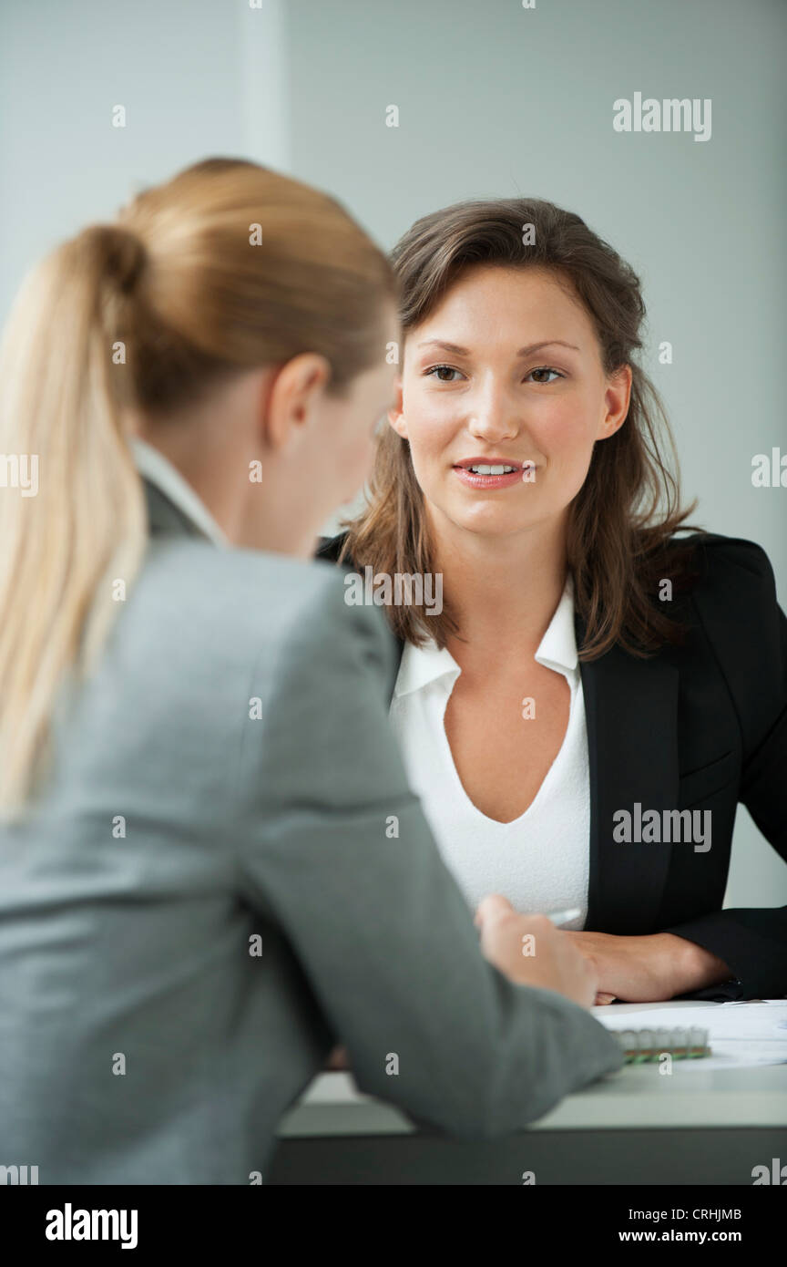 Businesswoman interviewing job applicant Stock Photo - Alamy