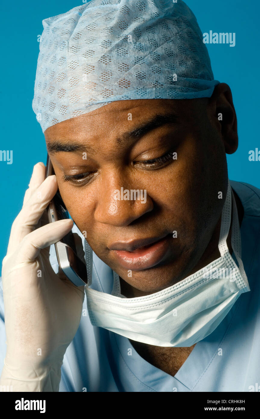 Surgeon talking on his mobile phone hi-res stock photography and images ...