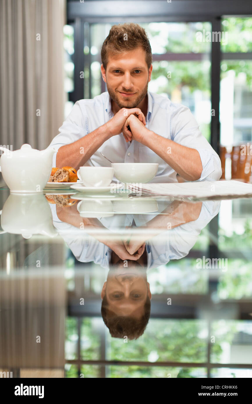 Cup posing seated sitting smiling table hi-res stock photography and ...