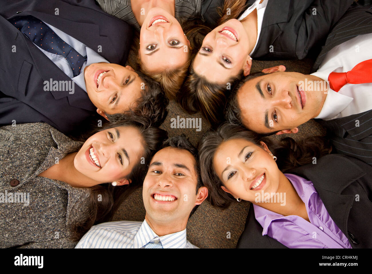 business people teamwork in an office with heads together Stock Photo ...