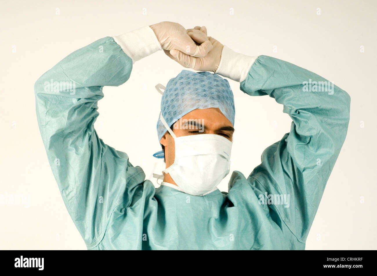 Tired surgeon stretching Stock Photo - Alamy
