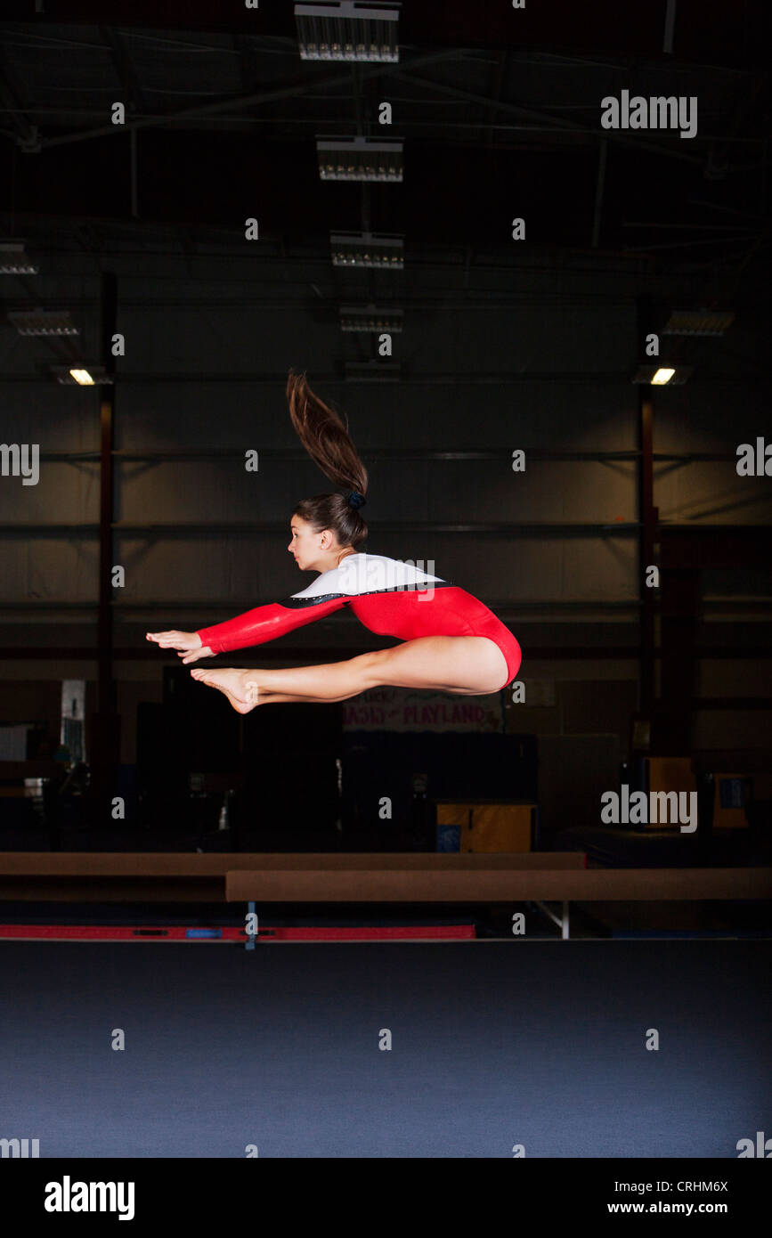 Gymnast jumping in air Stock Photo - Alamy