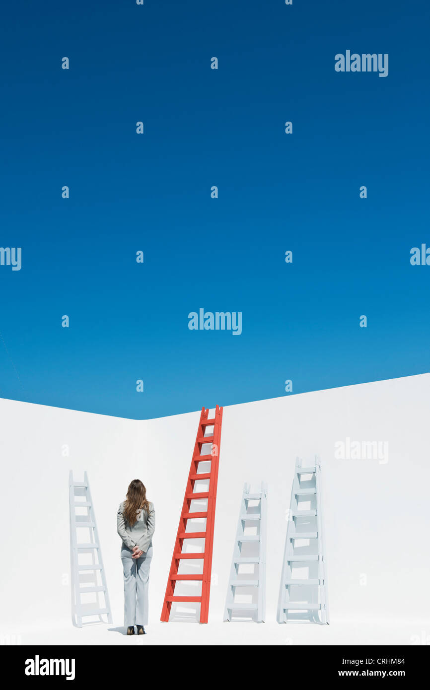 Woman climbing ladder from behind hi-res stock photography and images ...