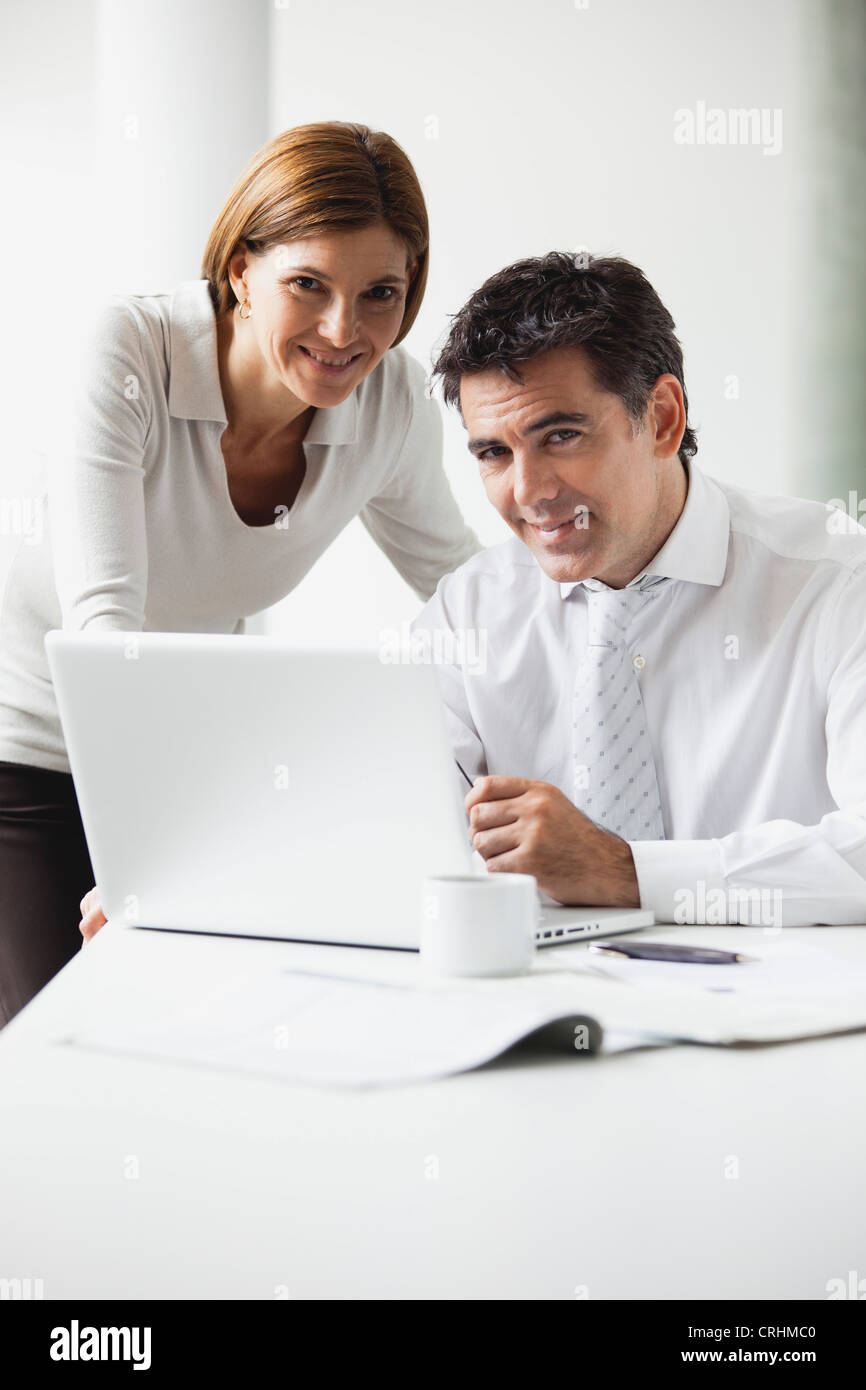 Collaborating on laptops two women hi-res stock photography and images ...