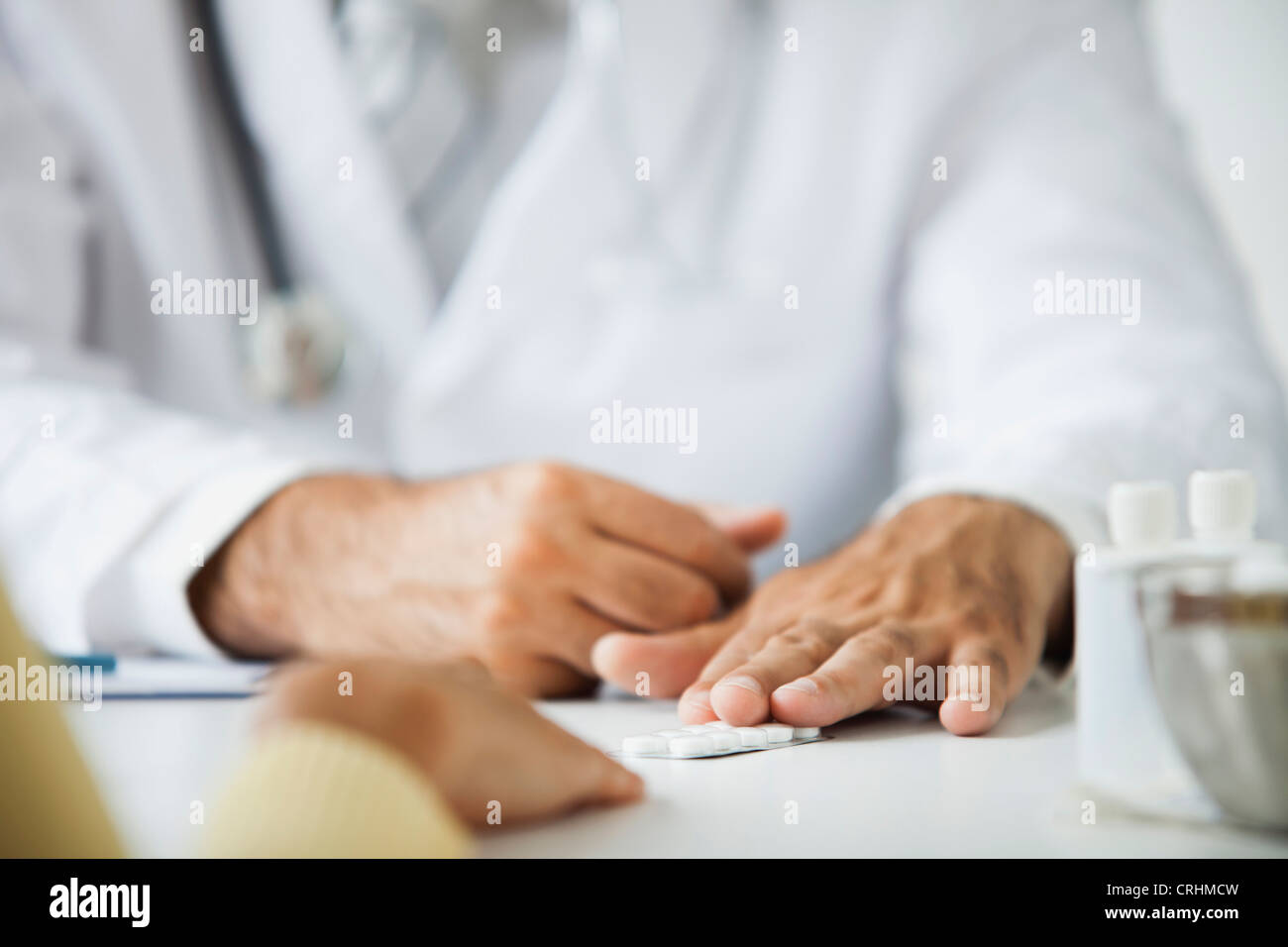 Doctor providing patient with prescription drugs Stock Photo - Alamy