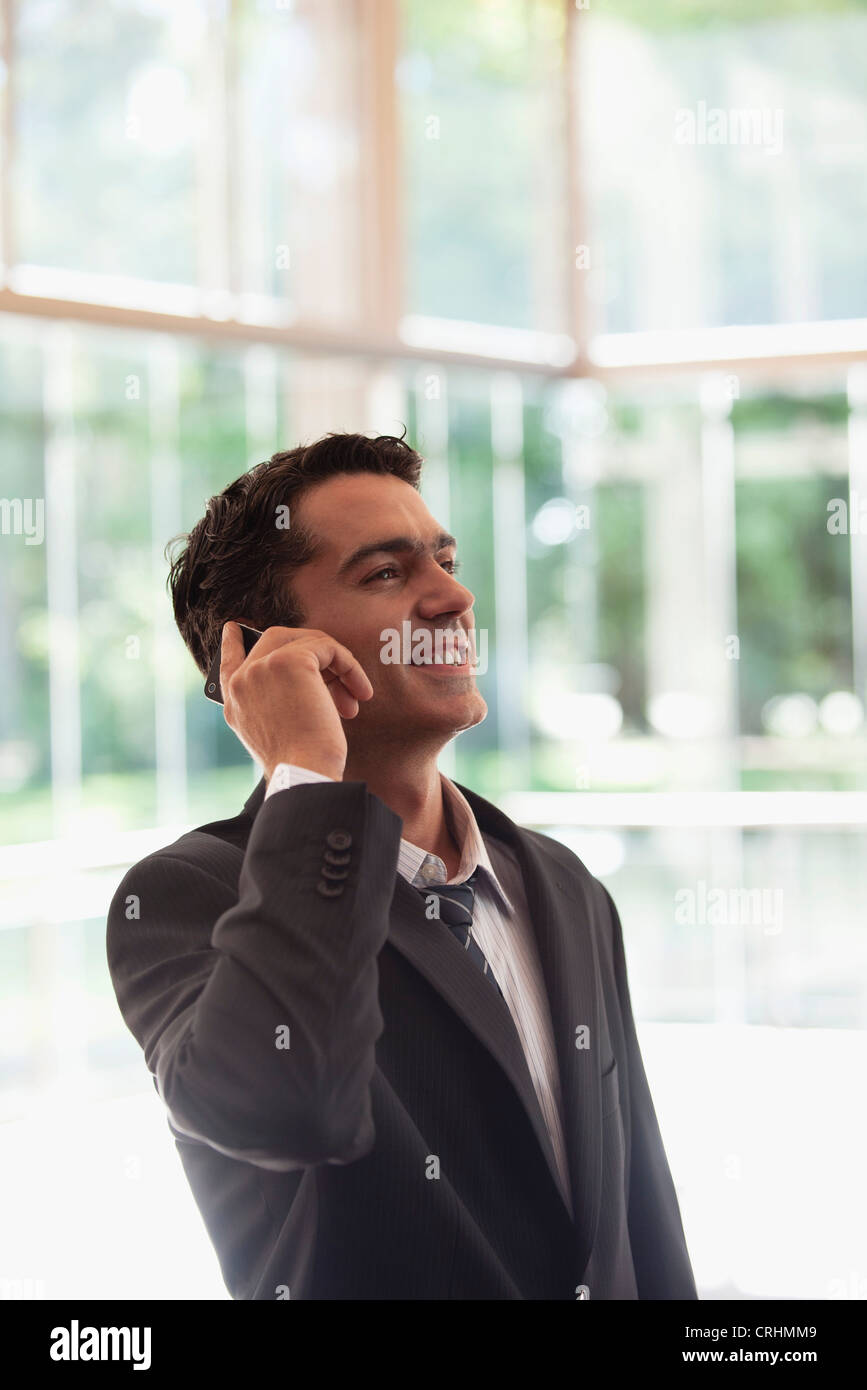 Businessman using cell phone Stock Photo - Alamy